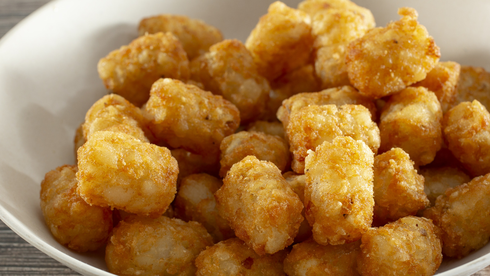19 Unexpected Toppings To Load On Your Tater Tots