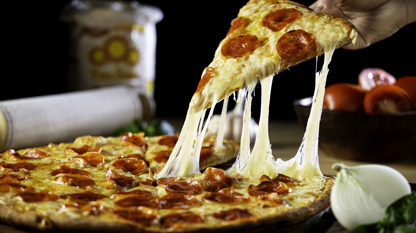 A Spoonful Of Water Is Your Secret Weapon For Reheating Pizza