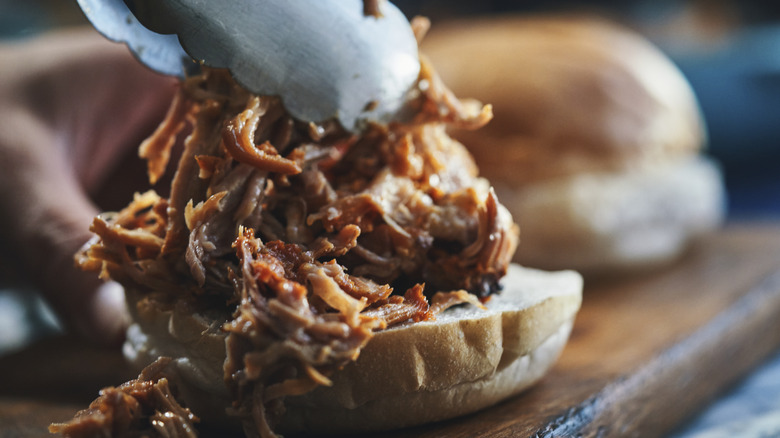 This Juice Is The One Ingredient Your Slow Cooker Pulled Pork Is Missing