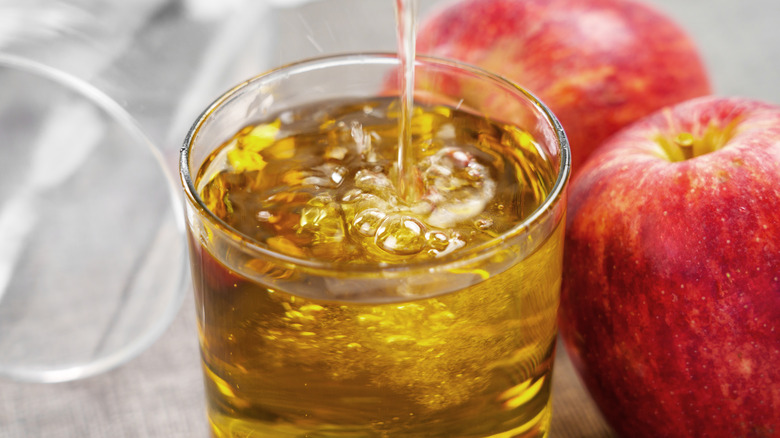 This Juice Is The One Ingredient Your Slow Cooker Pulled Pork Is Missing