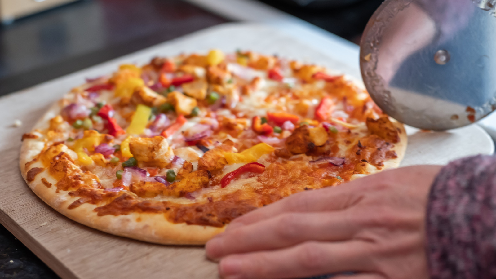Easily Upgrade Frozen Pizza With A Classic Ingredient You Already Have