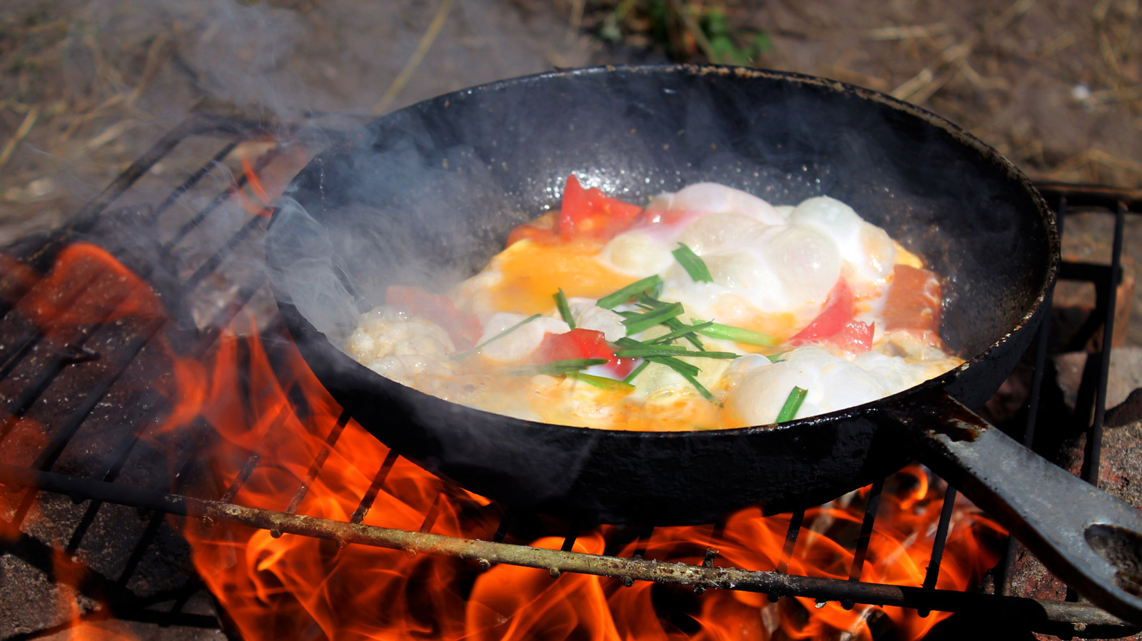 How To Season Cast Iron Over An Open Campfire