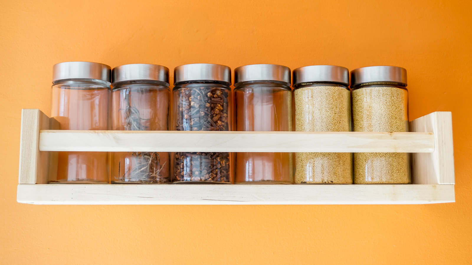 The Lid Twisting Trick So You Never Deal With Clumpy Spices Again