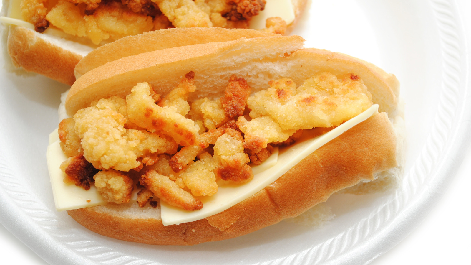 New England's Clam Roll Is The Lobster Roll's Lesser-Known, Deep-Fried ...