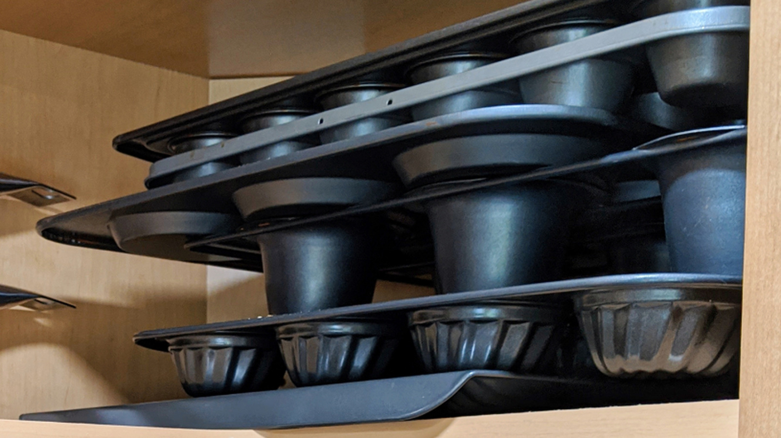 One Genius Storage Technique For Baking Pans Can Open Up Tons Of ...