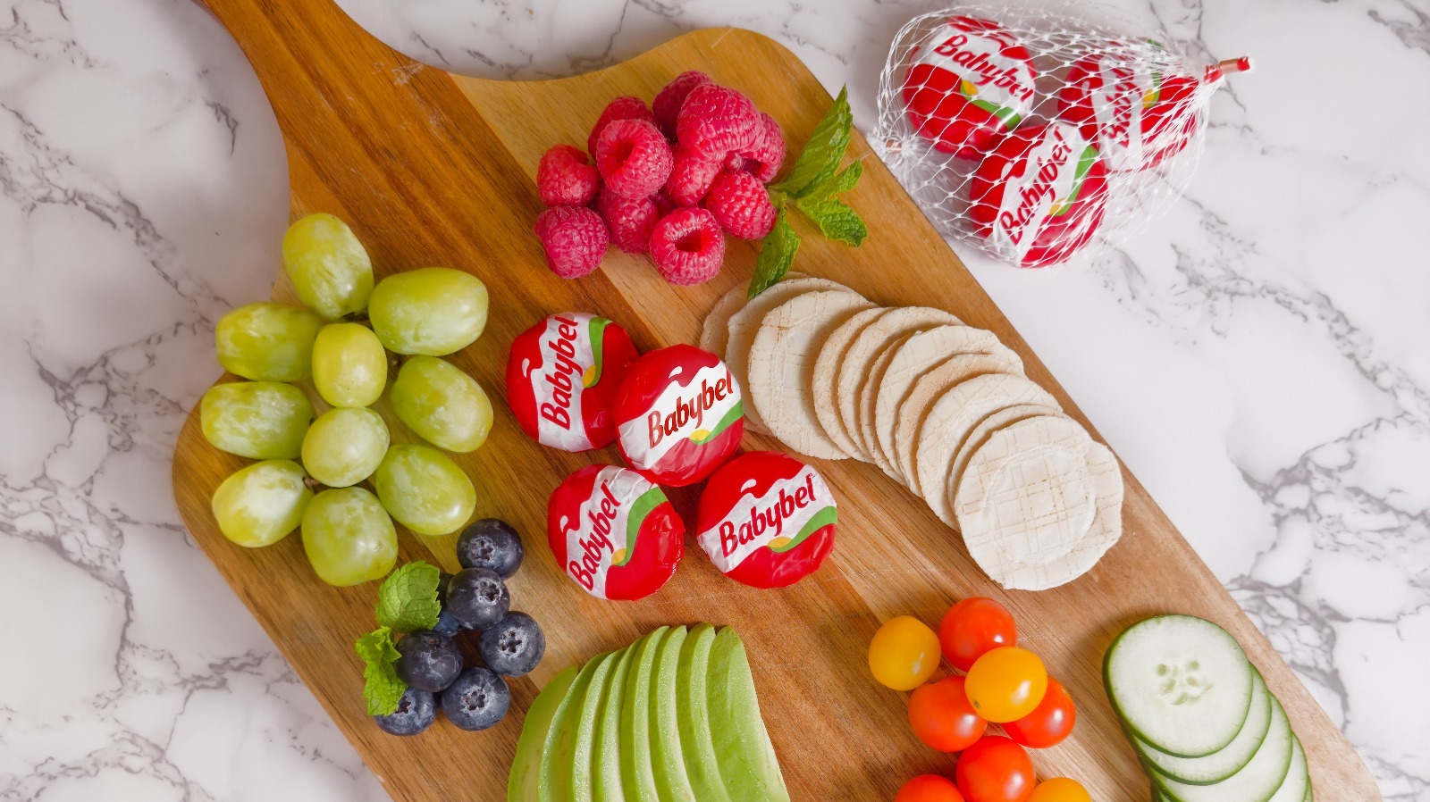 The Cheese Varieties Behind Babybel's Iconic Minis