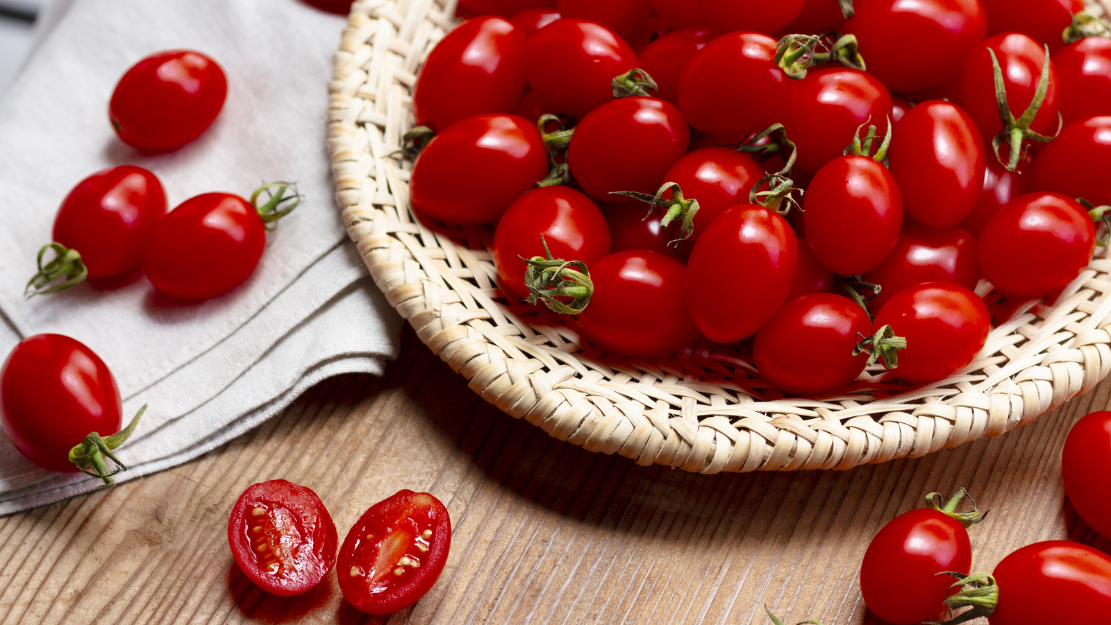 Learn A Simple Hack To Slice A Dozen Cherry Tomatoes With Two Flat Surfaces