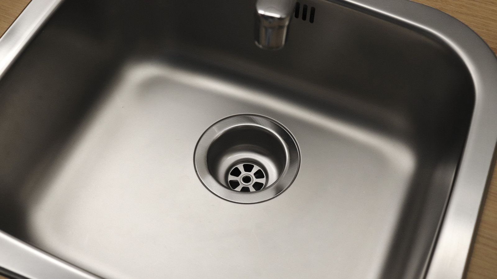 The Paper Trick To Keep Your Kitchen Sink From Smelling Bad