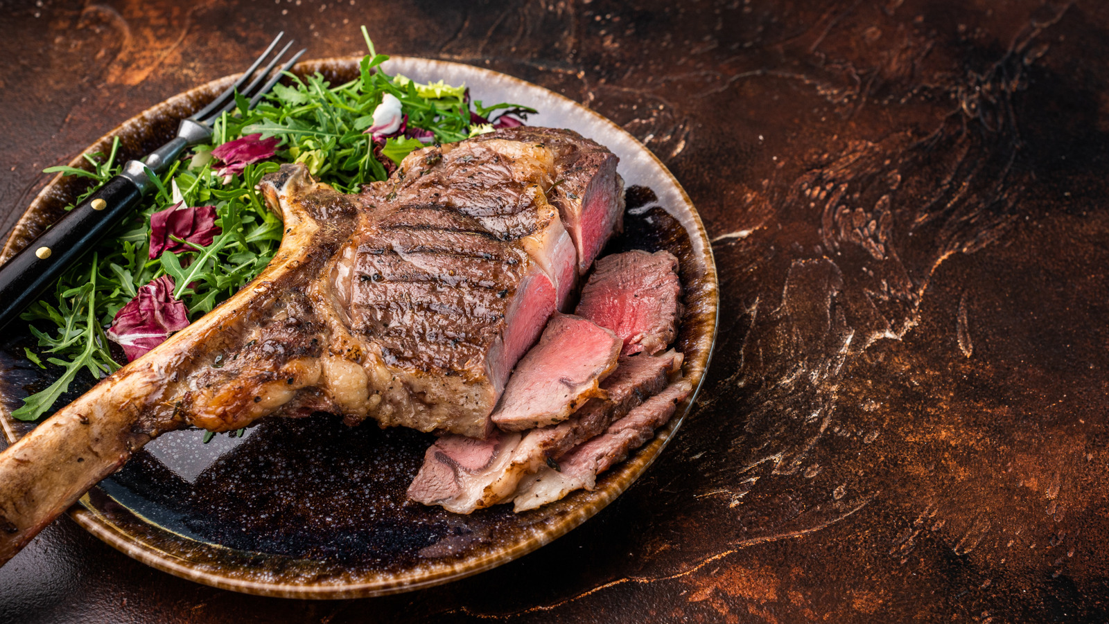 The Polite Way To Eat Bone-In Steak At A Fancy Steakhouse