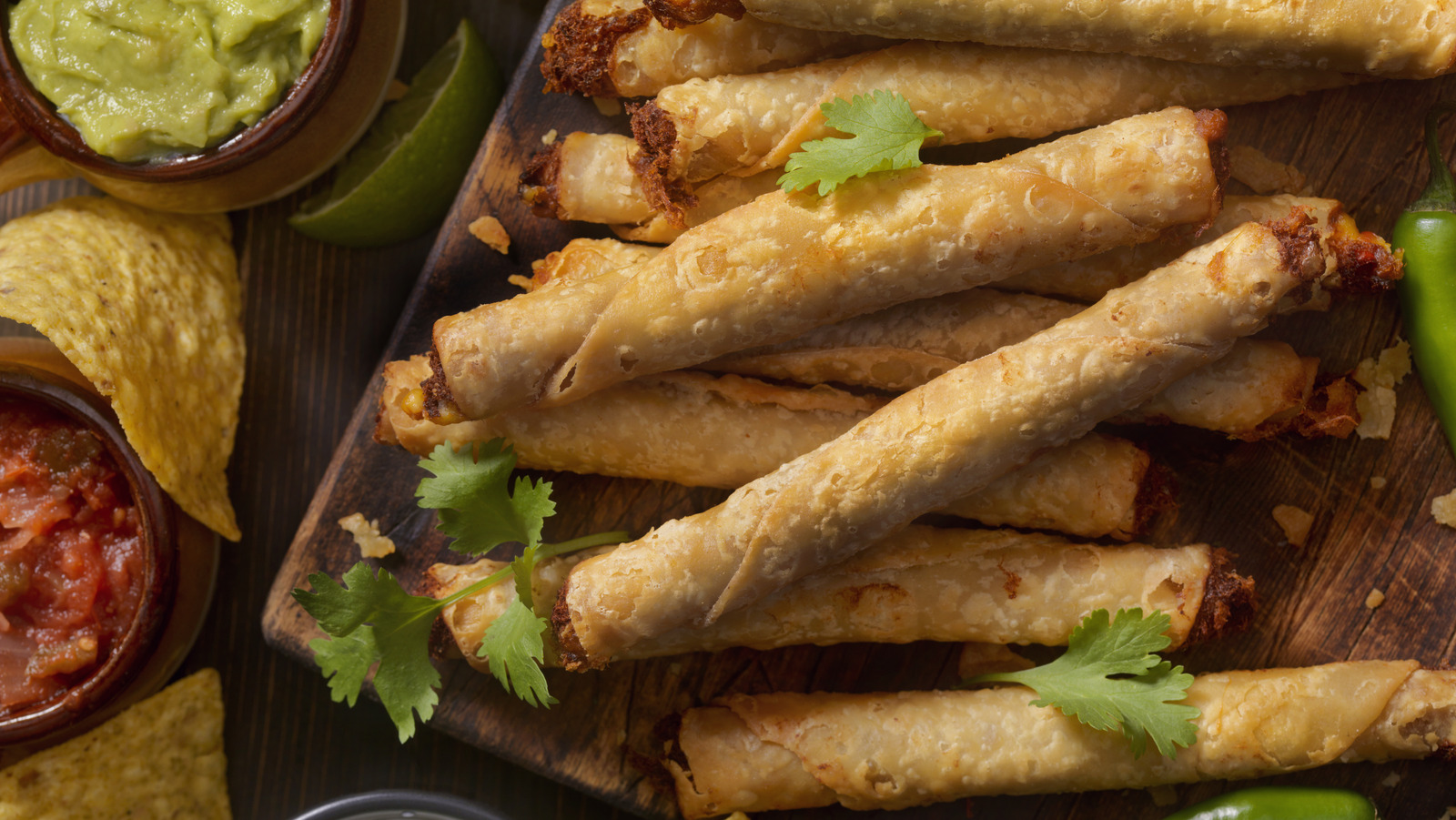 Turn Frozen Taquitos Into The Easiest Enchilada Casserole Ever