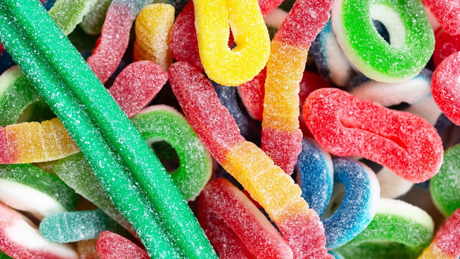 What's That White Stuff On Sour Candy? Here's The Real Answer