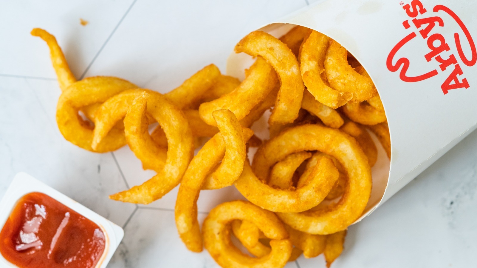 Why Arby's Sells 2 Different Types Of Fries On Its Menu
