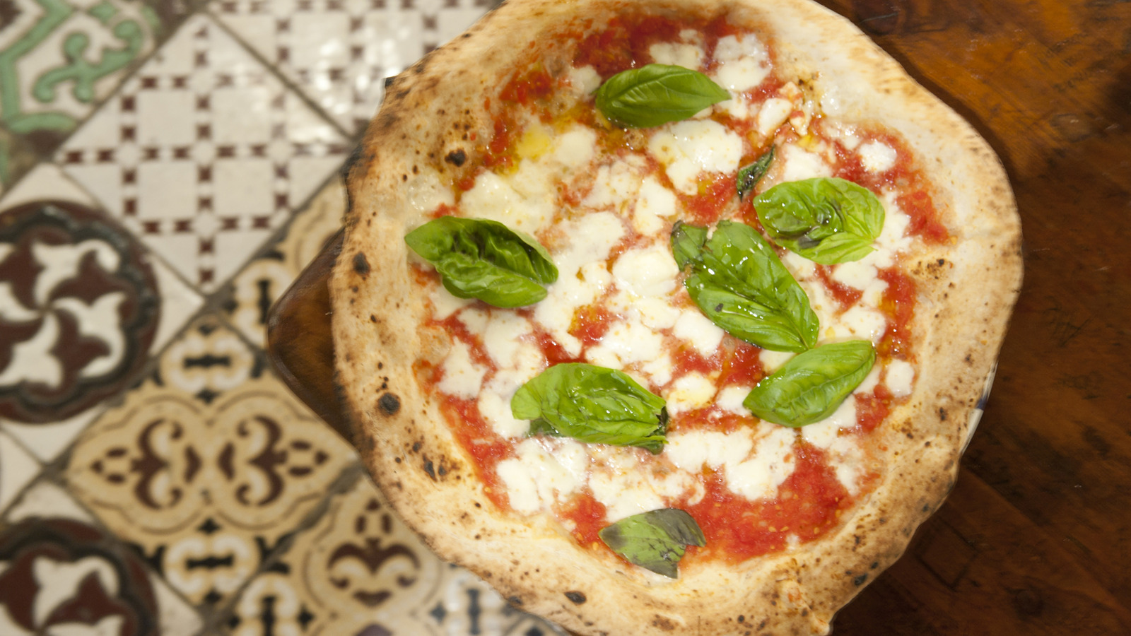 Yes, Pizza Is Served Unsliced In Italy. Here's Why.